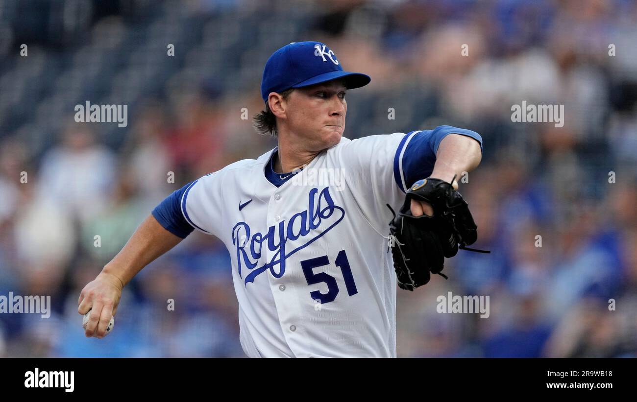 Kansas City Royals starting pitcher Brady Singer throws during the ...
