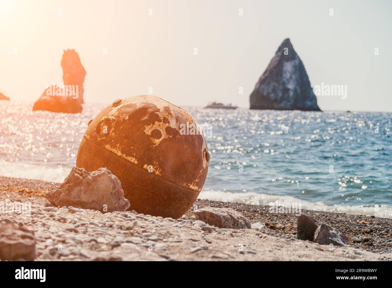 Old rusty sea mine on the beach Stock Photo - Alamy