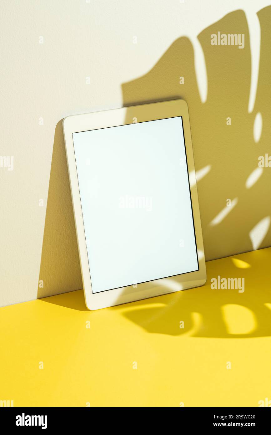 White screen digital tablet mockup, template on yellow and white ...