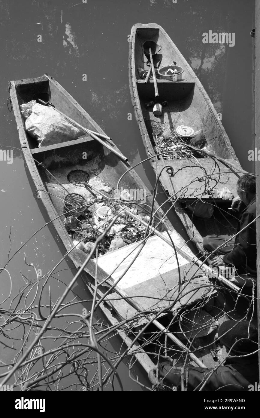 Garbage collection boat Black and White Stock Photos & Images - Alamy