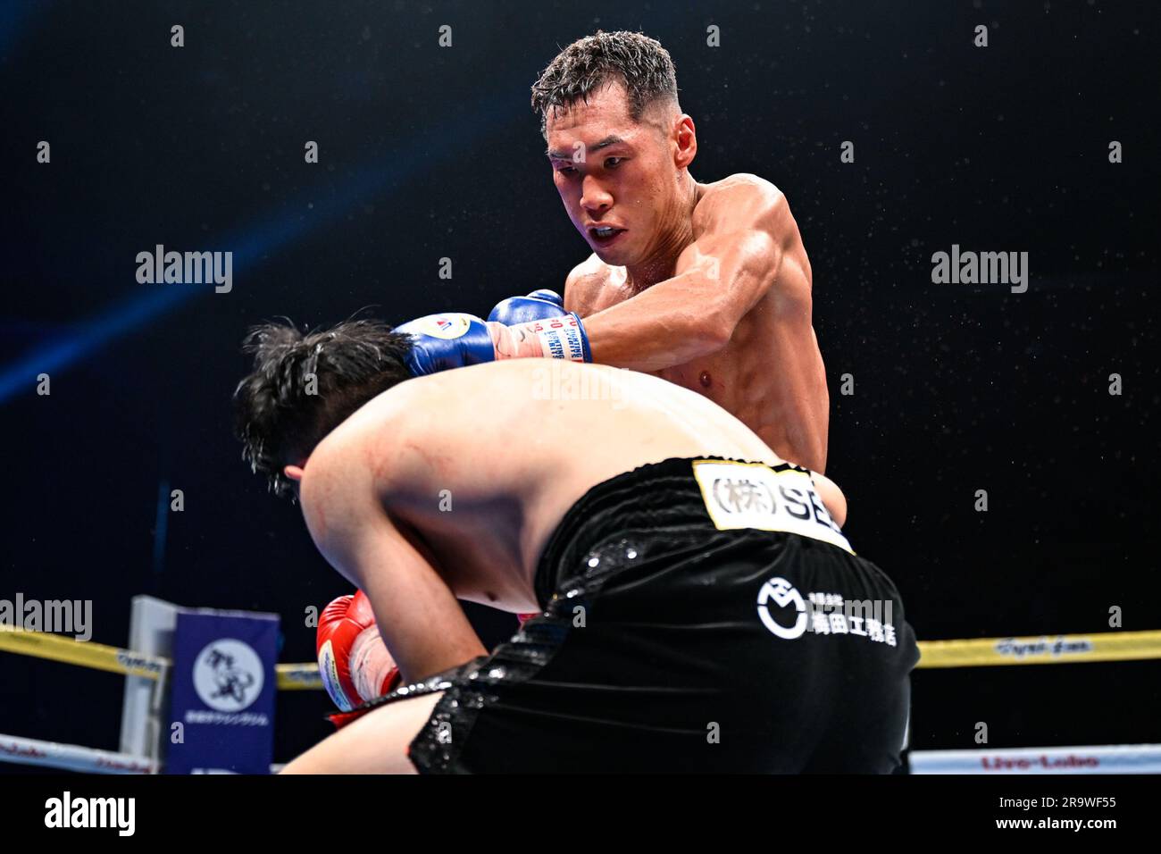 Tokyo, Japan. 24th June, 2023. Takuya Watanabe (blue gloves) hits ...