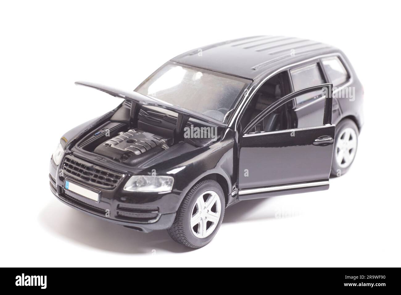 toy car with open hood and door isolated on white background Stock ...