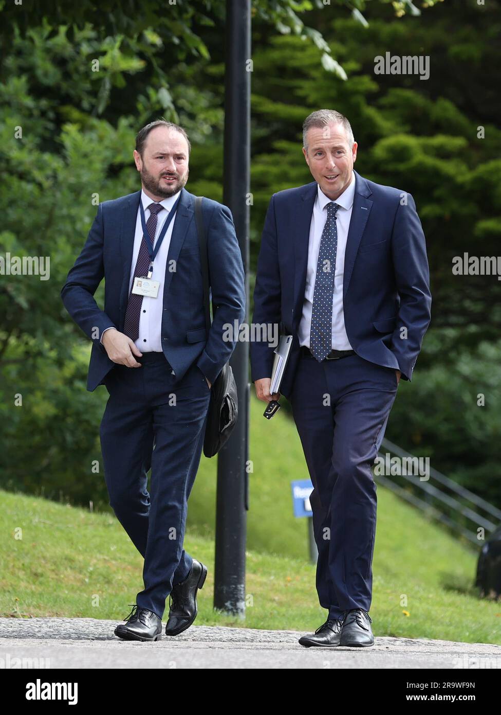 DUP MLA Paul Given (right) and Clive McFarland arriving at Stormont ...