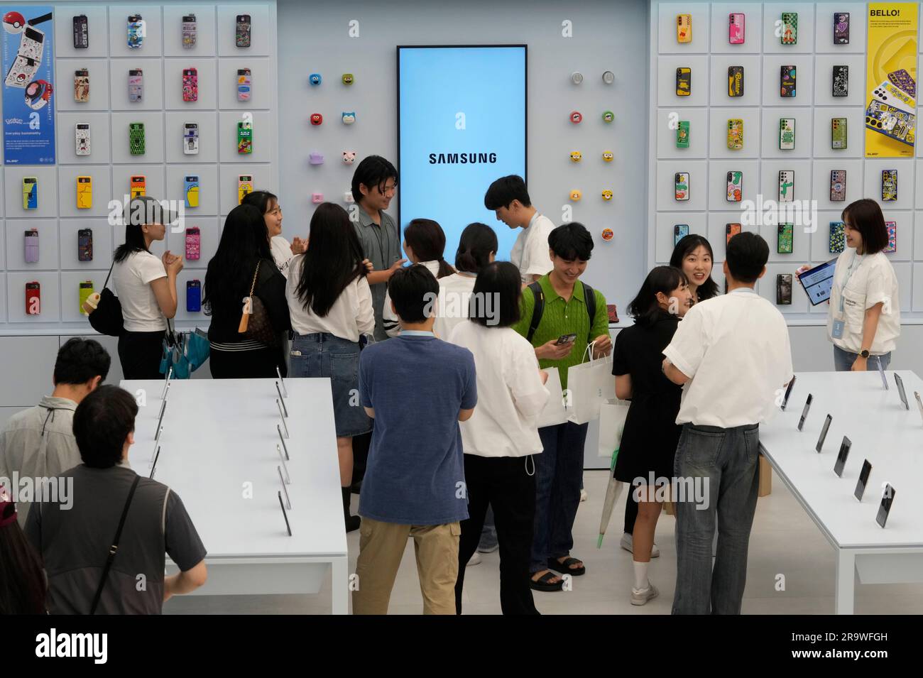 People watch accessories of Samsung Galaxy smartphones at Samsung ...