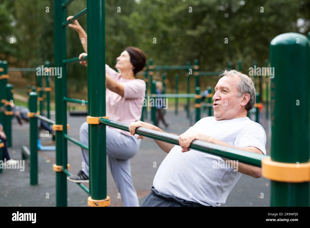 Staying after retirement. Happy joyful mature retired sportsman wearing ...