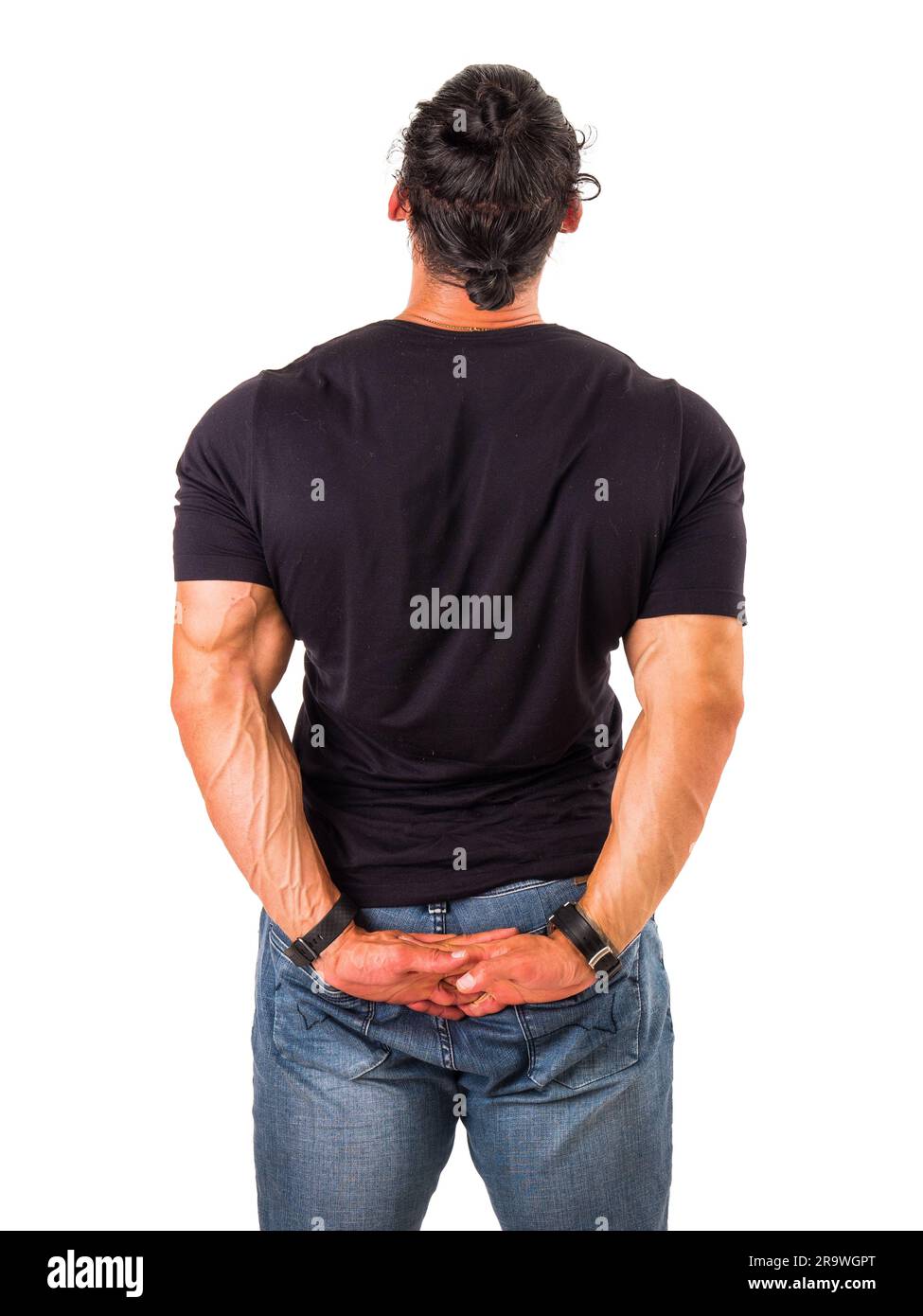 Handsome muscular man stretching arm and shoulder in studio Stock Photo ...