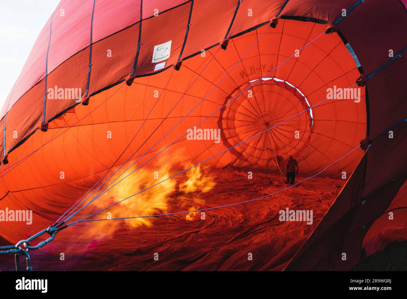 Hot Air Balloon Flight over Trakai. Inflating the hot air balloon in a ...
