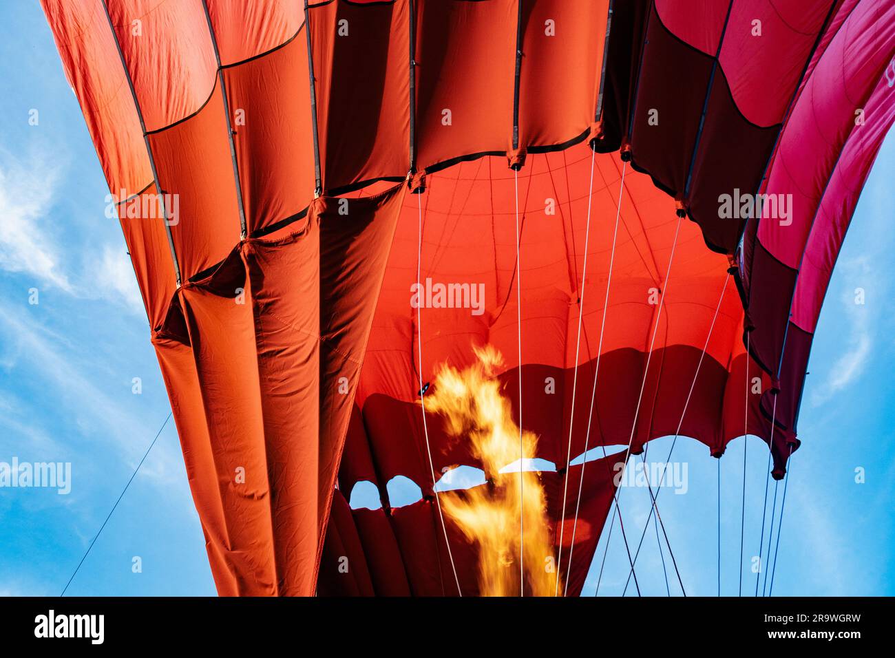Hot Air Balloon Flight over Trakai. Inflating the hot air balloon in a ...