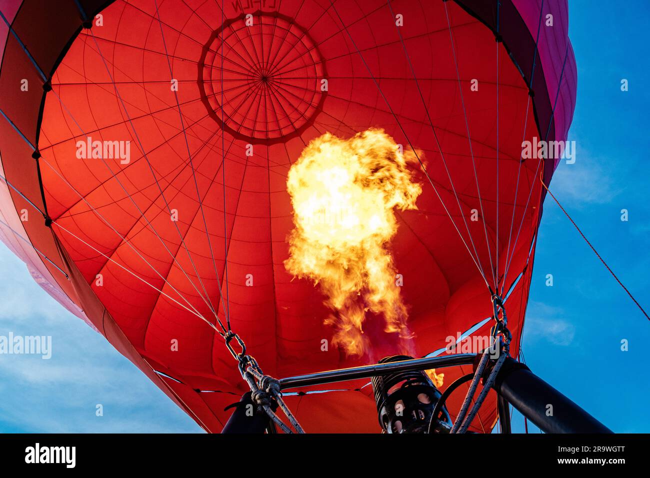 Hot Air Balloon Flight over Trakai. Inflating the hot air balloon in a ...