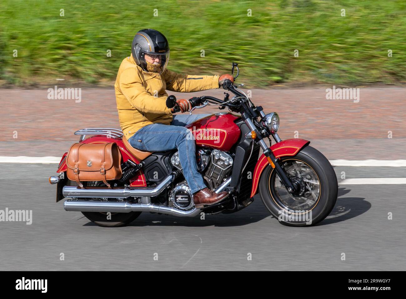 Indian Motorcycle Rider; INDIAN SCOUT SIXTY bike driven on the M61 ...