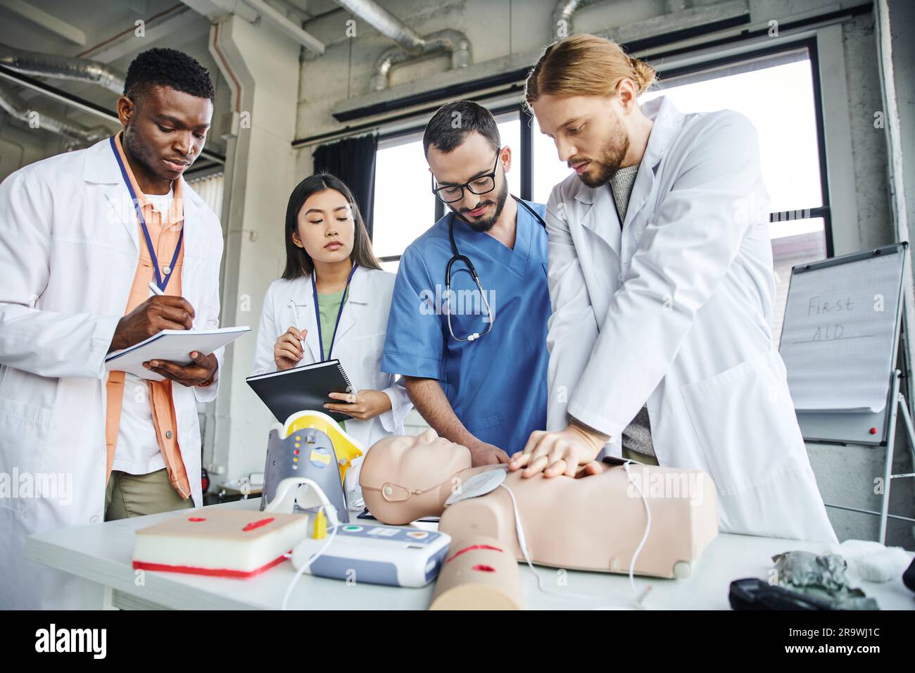 Students writing in notebooks hi-res stock photography and images - Alamy