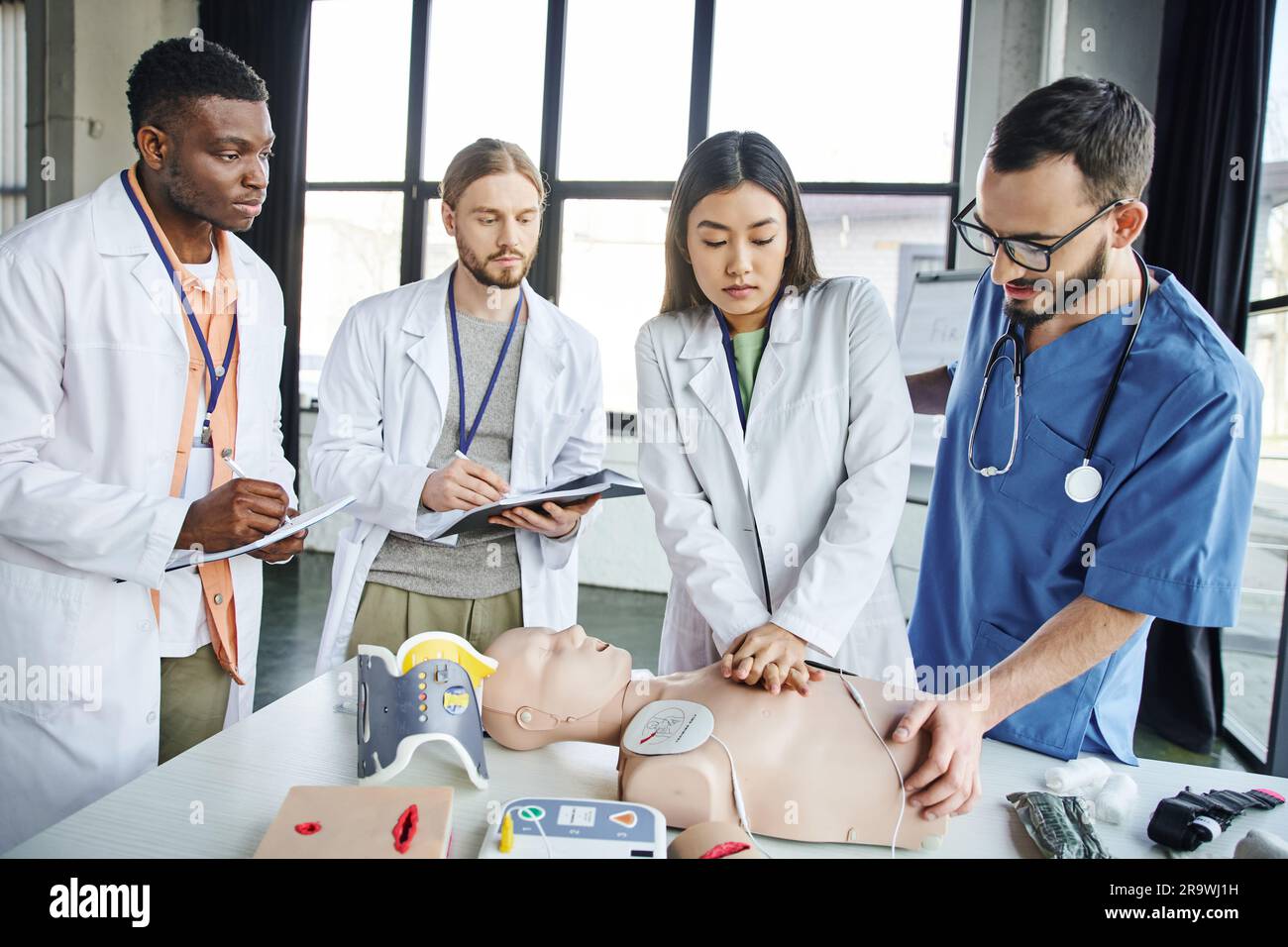 Students writing in notebooks hi-res stock photography and images - Alamy