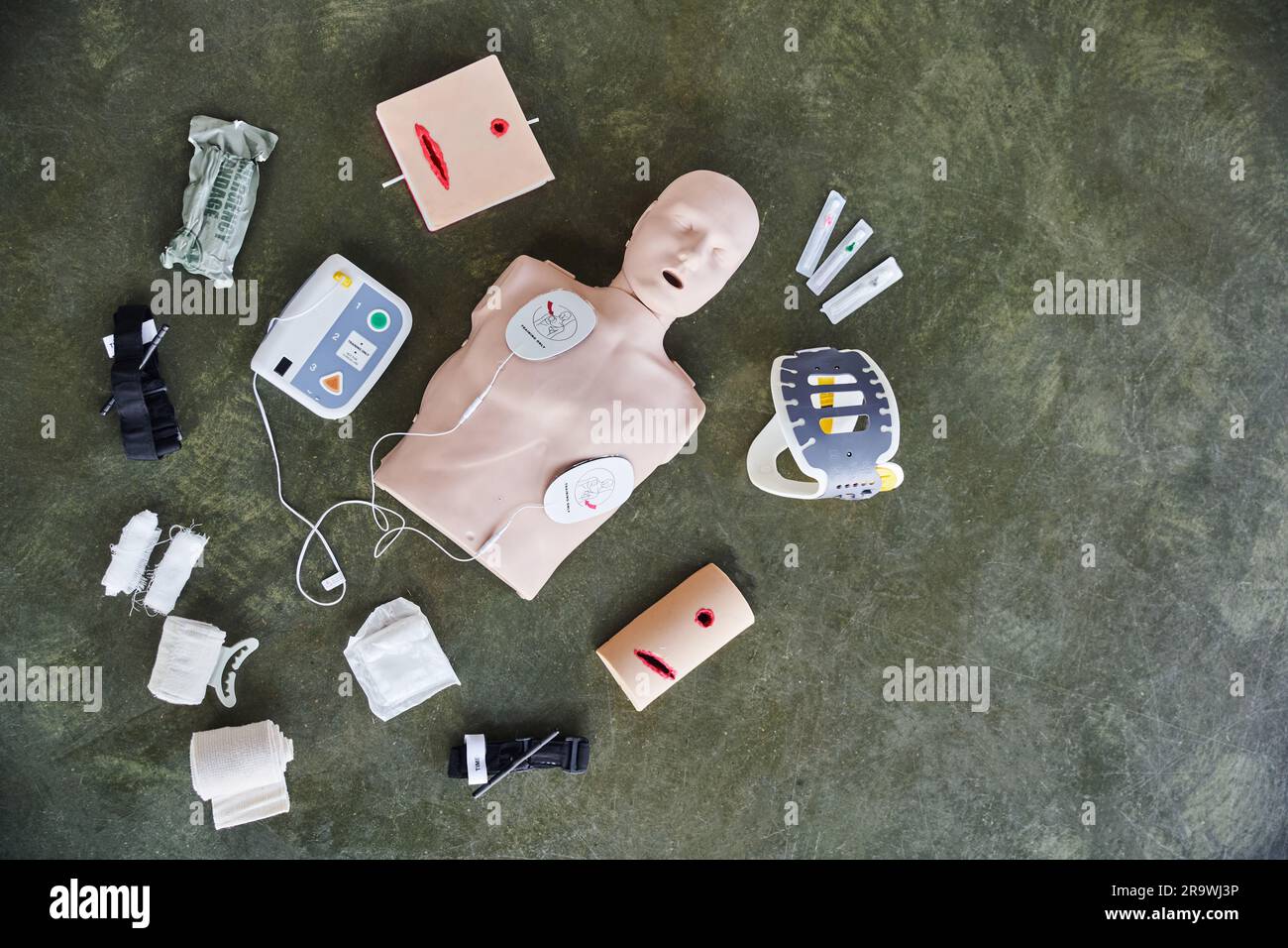 top view of CPR manikin, automated external defibrillator, wound care simulators, compressive ...