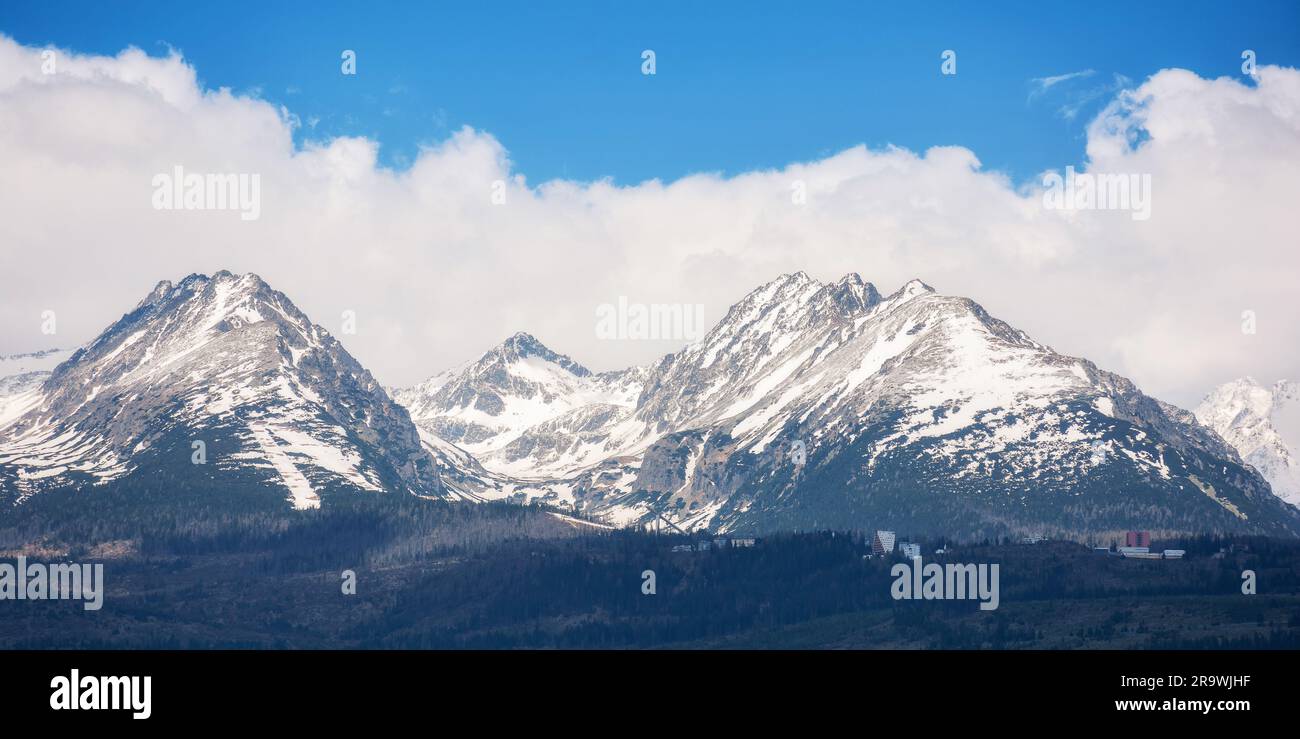 background image of high tatra peaks in spring. sunny scenery with ...