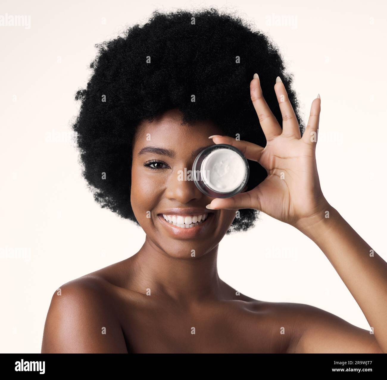 Black woman, cream and beauty, smile on face with cosmetics product and ...