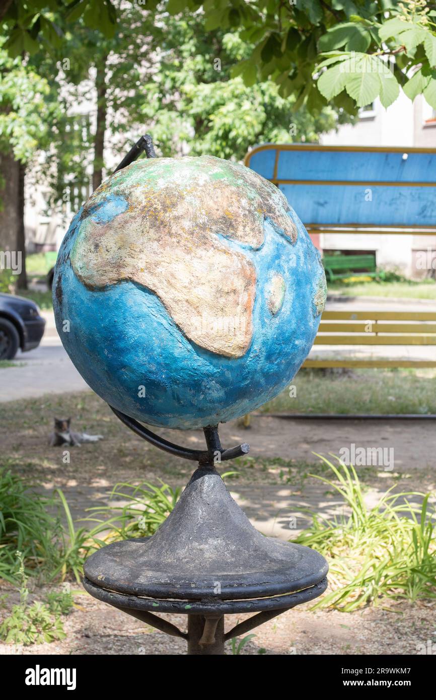 photo of a globe-like object standing in the street Stock Photo - Alamy