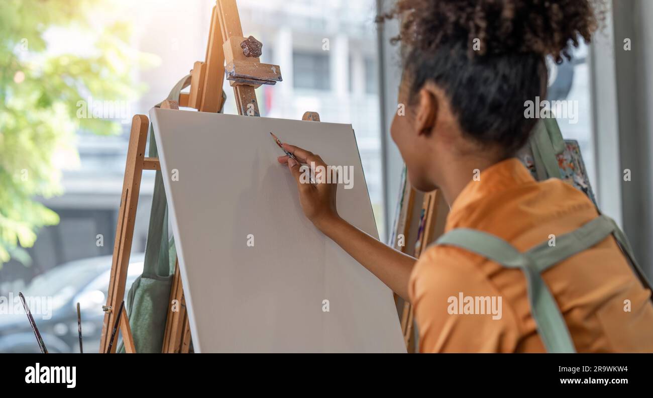 artist with pencil sketch picture at art studio Stock Photo - Alamy
