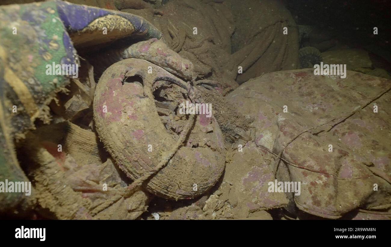 Wheelbarrow, barrels and other cargo inside hold of ferry Salem Express ...