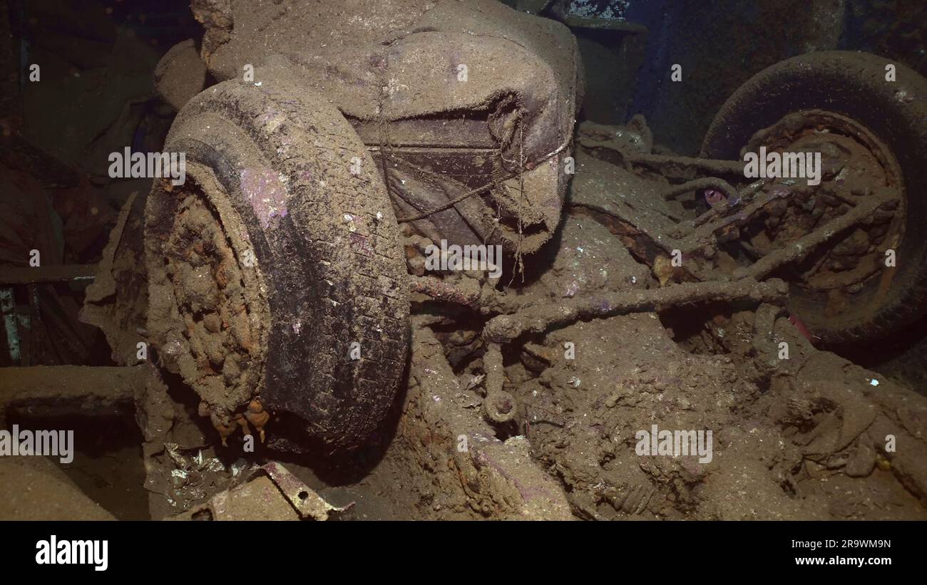 Overturned car and other cargo inside hold of ferry Salem Express ...