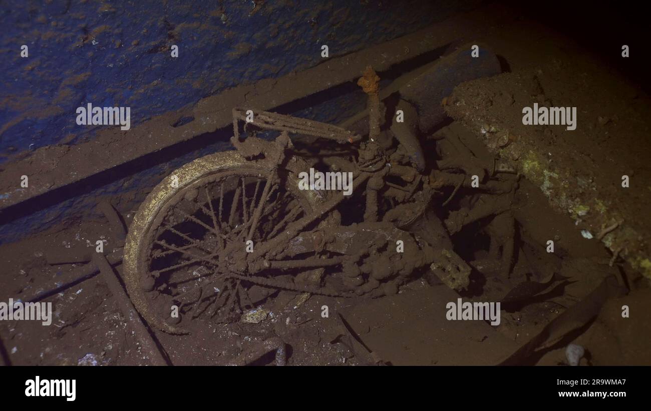 Bicycle luggage and personal belongings of passengers lie inside hold ...