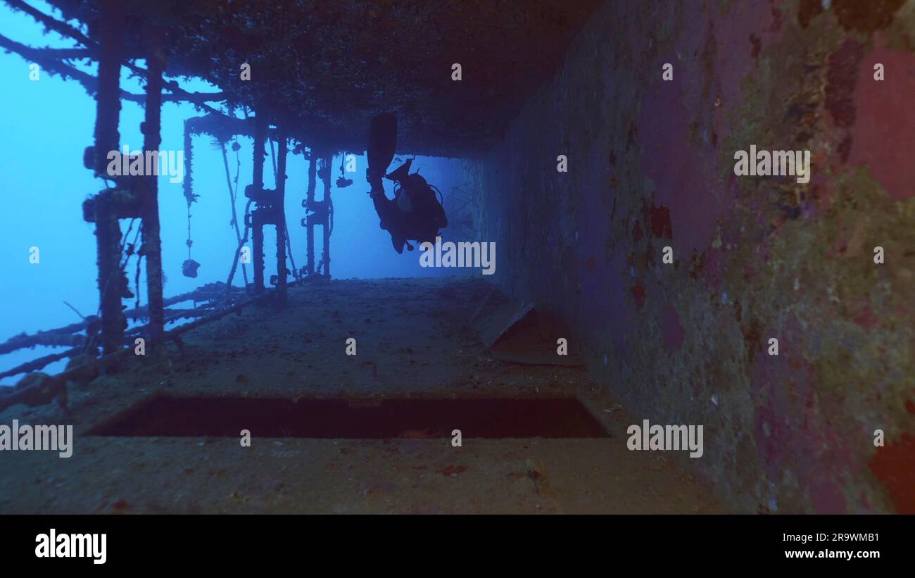 Scuba diver swim down corridor of ferry Salem Express shipwreck, Red ...