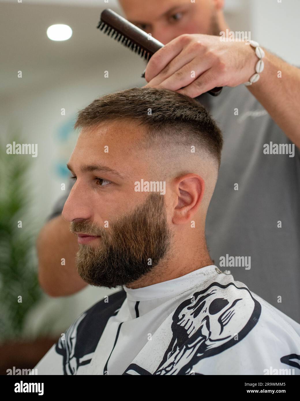 Getting a haircut Stock Photo - Alamy