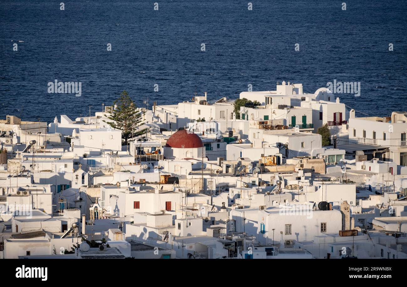 View over white Cycladic houses in the morning light, island and sea ...