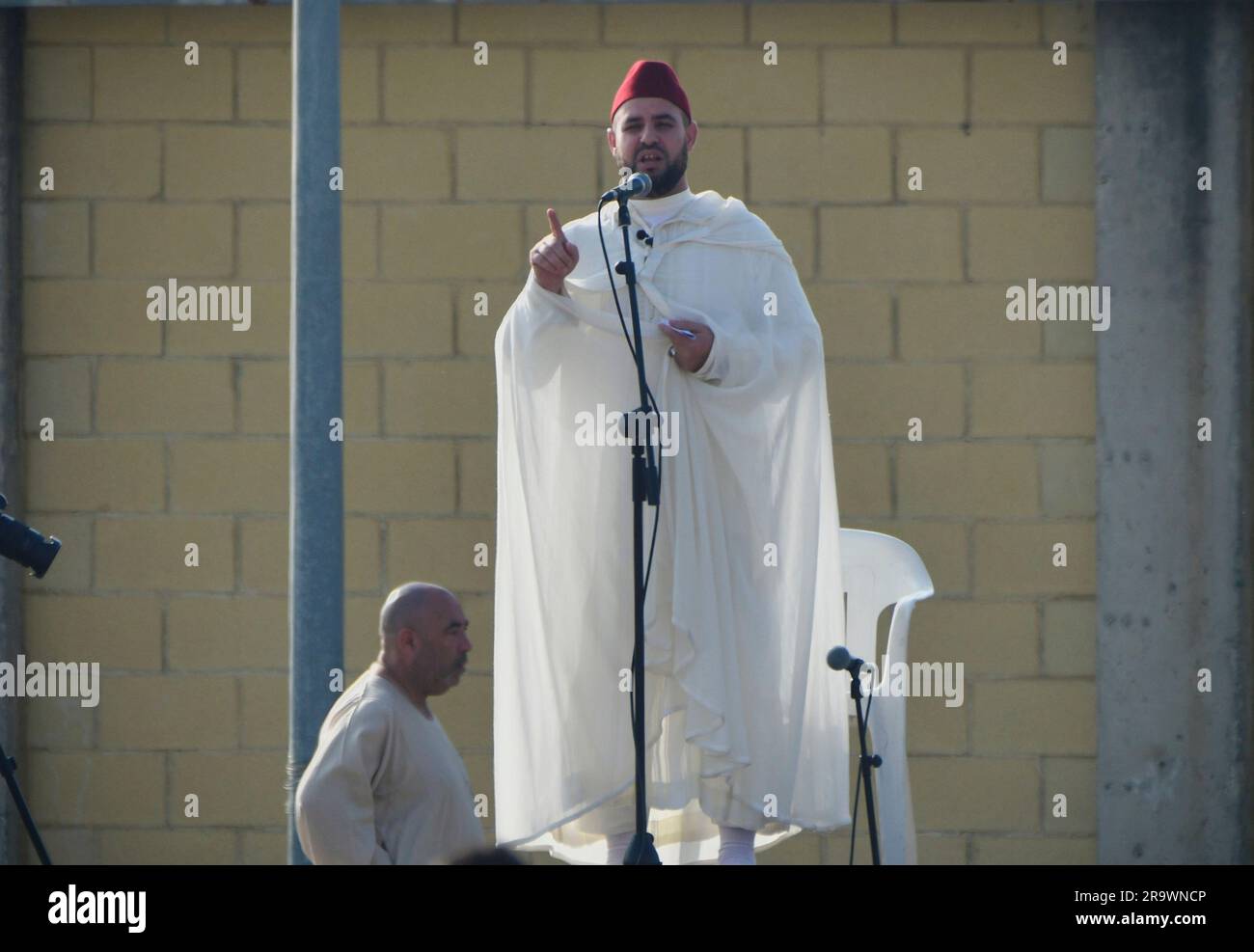Imam Abdelhakim speaks during the prayer on the day of the Feast of the ...