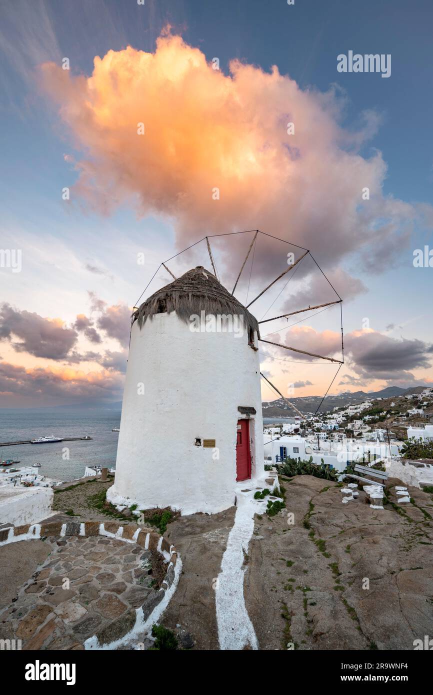 Bonis windmill at sunrise, view over white Cycladic houses, island and ...