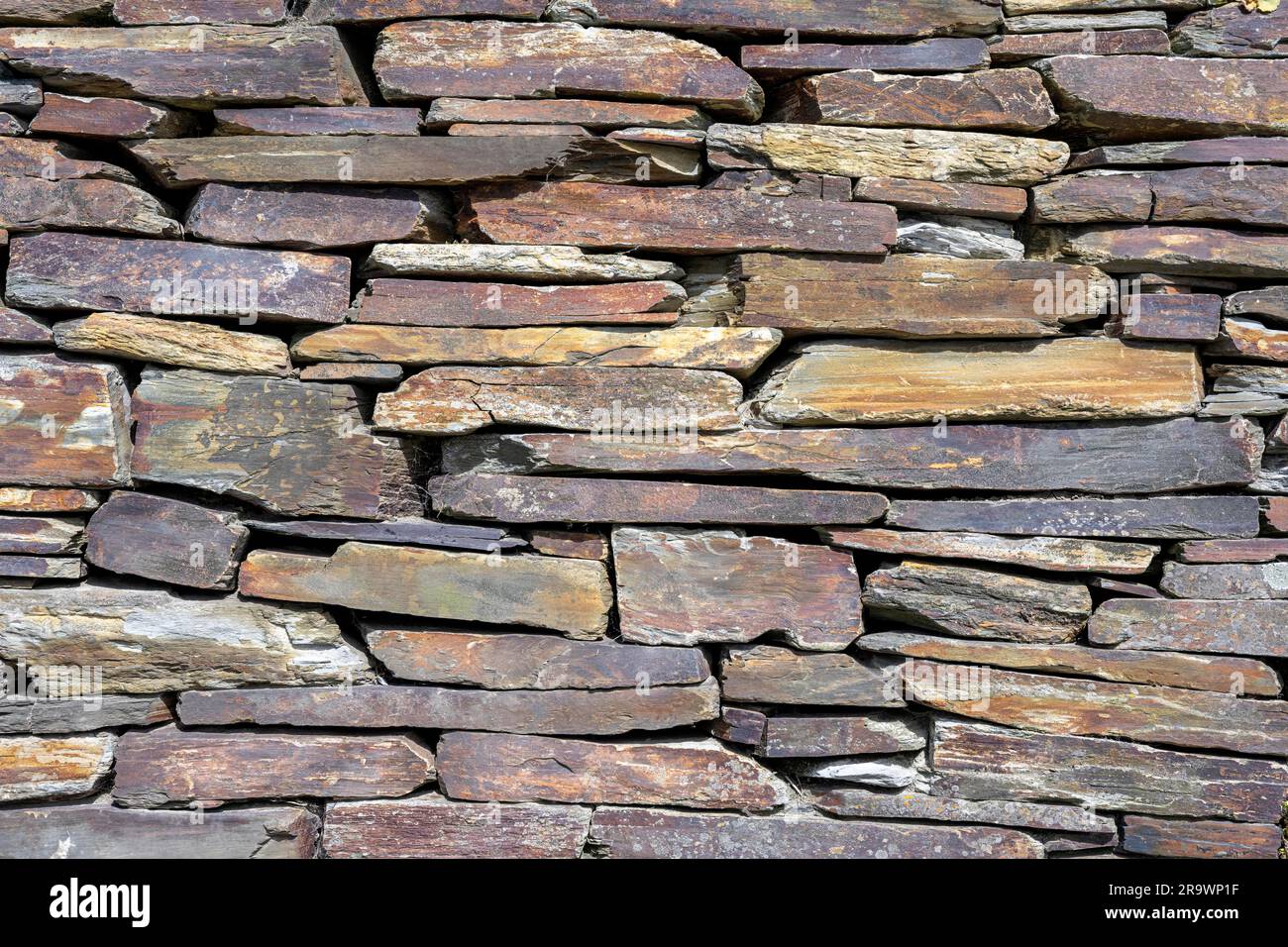 Slate slabs stacked to form a wall, full-size, Cornwall, England, Great ...