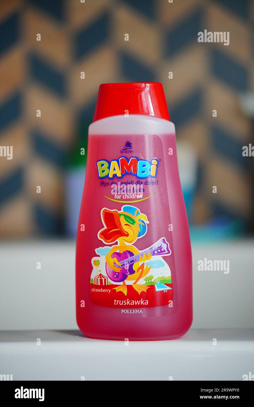 A pink shampoo bottle situated in a modern bathroom Stock Photo - Alamy