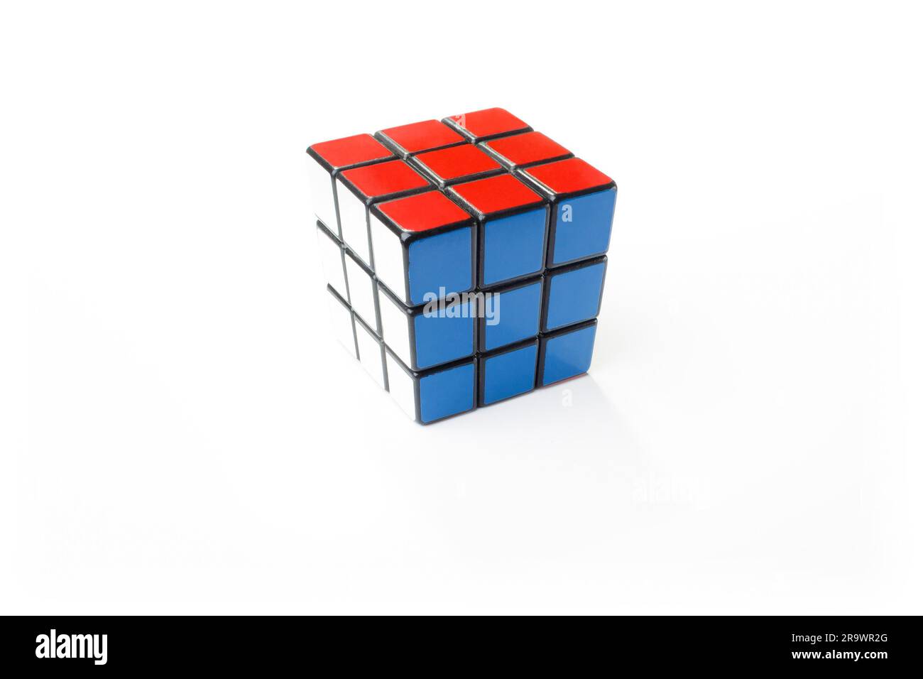 KIEV, UKRAINE - DECEMBER 26, 2014: Rubik's cube on the white background. Rubik's Cube on a white ...