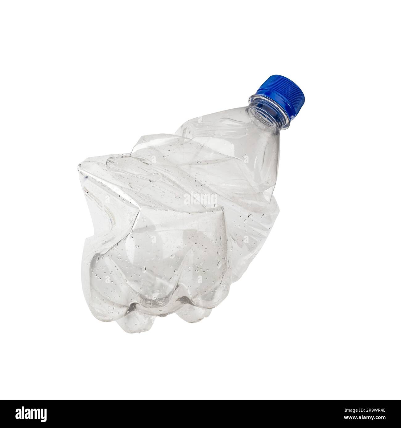 An empty smashed white plastic bottle, isolated on white background ...