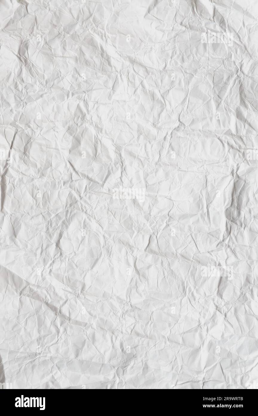 A crumpled whit paper texture for background use Stock Photo - Alamy