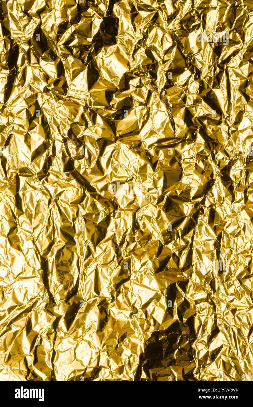Wrinkled gold foil hi-res stock photography and images - Alamy