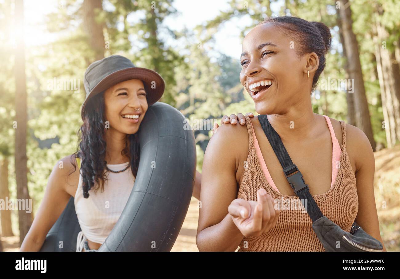 Women friends, camping and smile in woods, sunshine or funny chat on ...