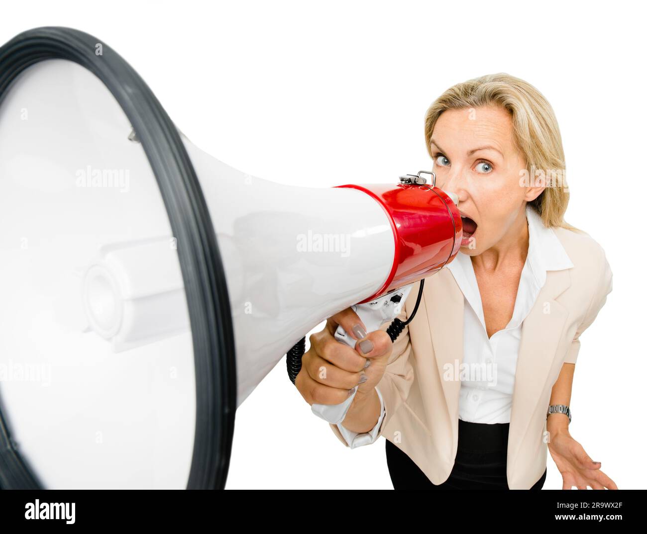Megaphone, portrait and mature woman in studio with wow news, sale or ...