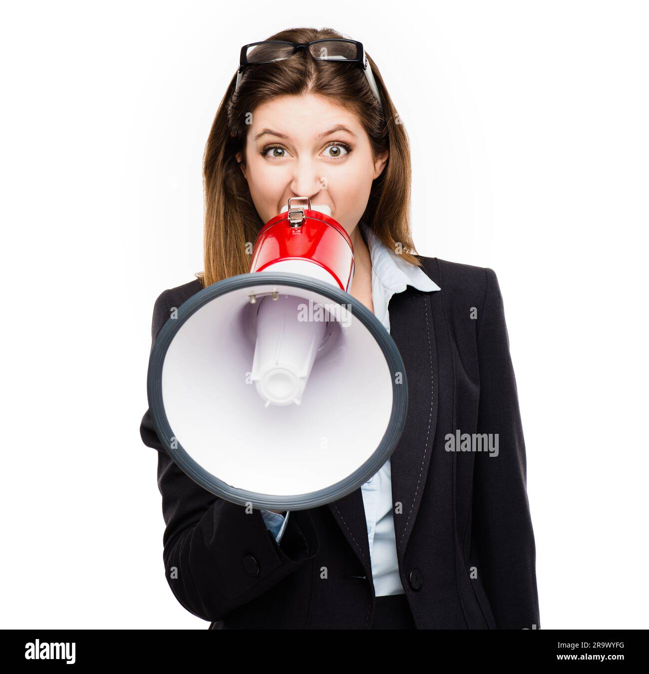 Business woman, megaphone and shouting in studio for serious ...