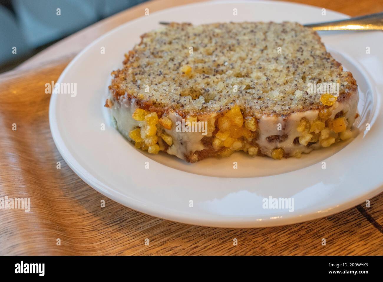 a delightful and moist cake made with lemon and yogurt, enriched with ...