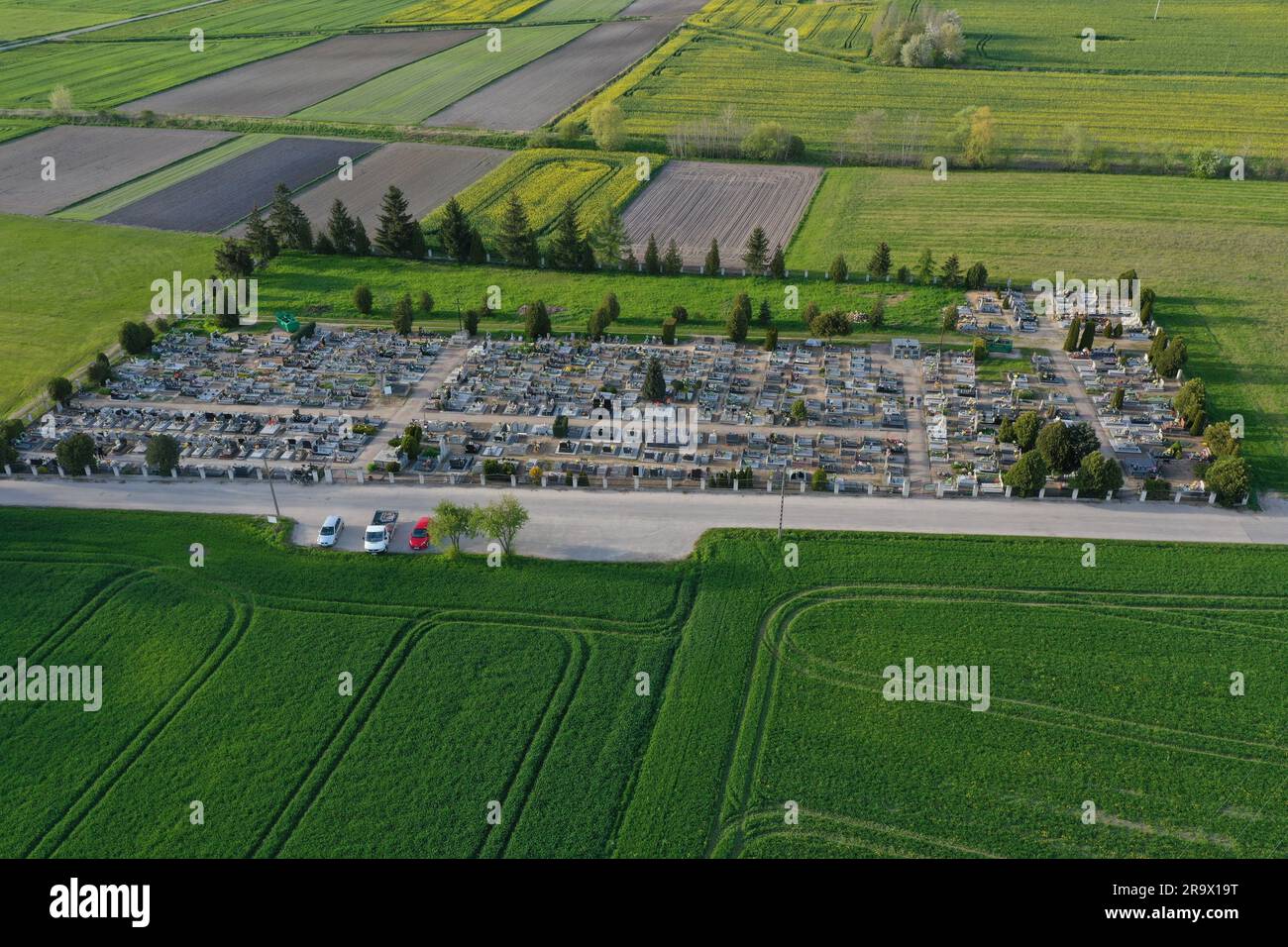 An aerial view of an idyllic rural landscape featuring lush green grass ...