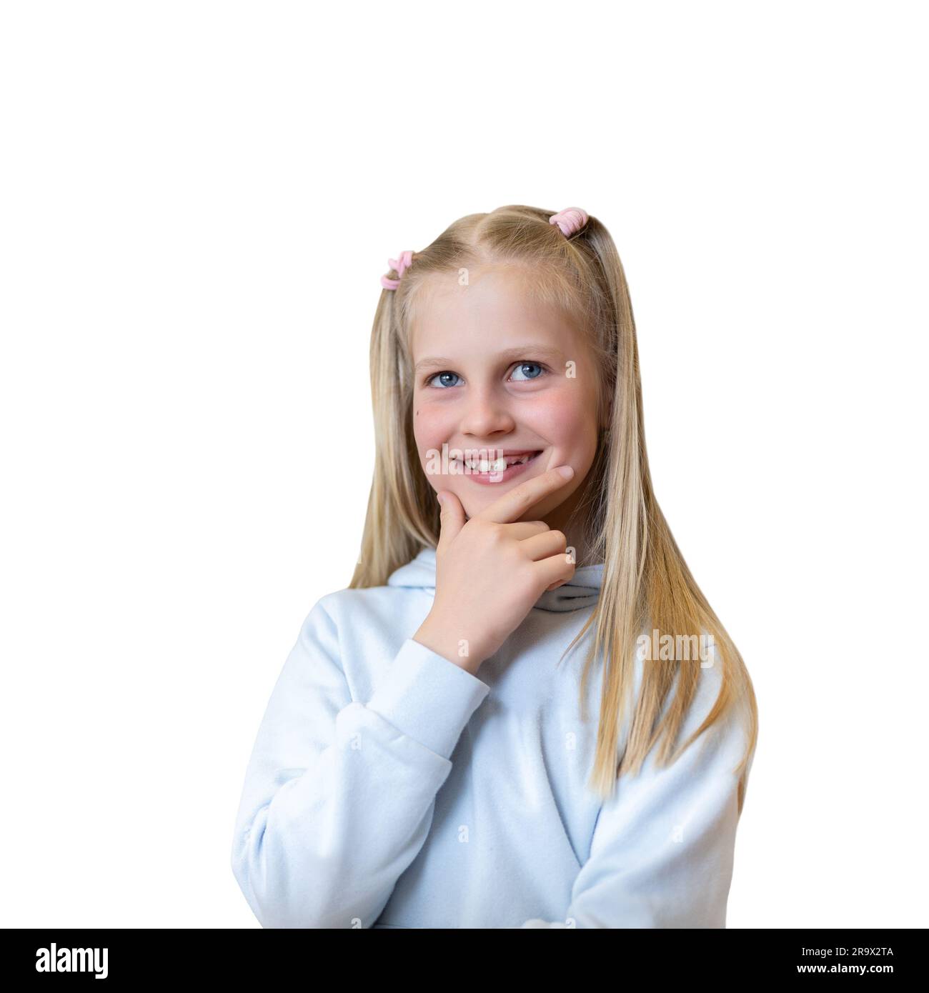 Portrait of cute little happy confident curious schoolgirl smiling with ...