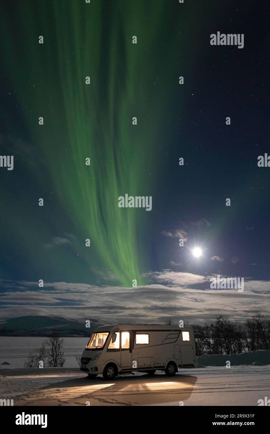 Motorhome by Lake Kilpisjaervi and Northern Lights (Aurora borealis) in ...