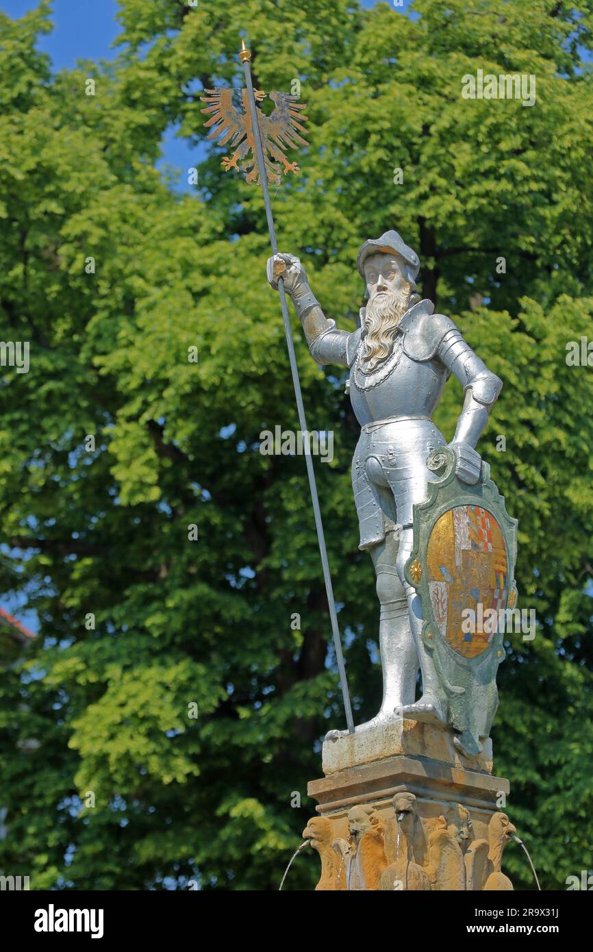 Hop fountain built 1573 and knight figure with lance and shield, eagle ...