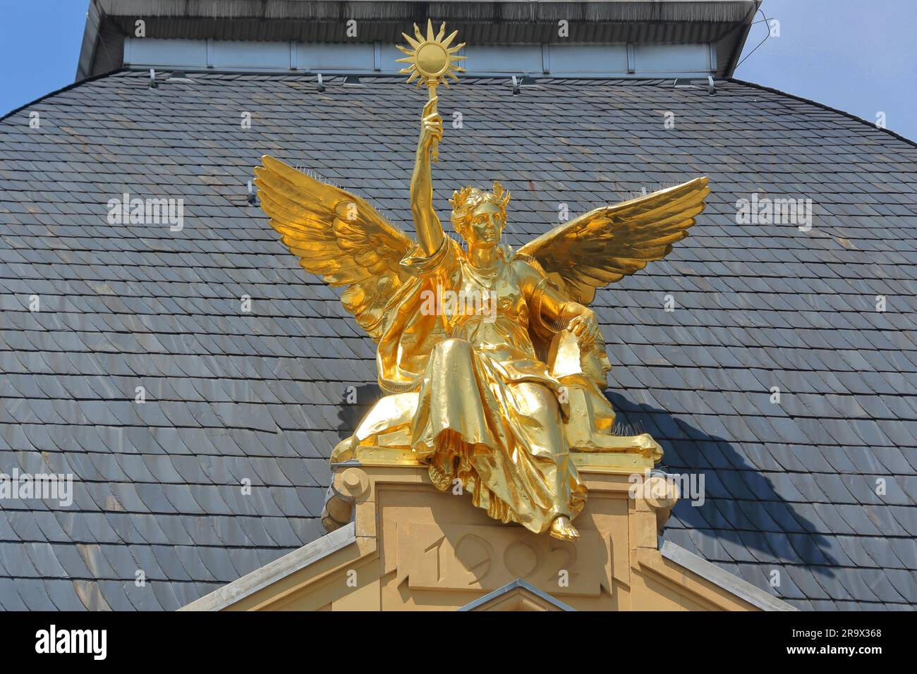 Golden sculpture Genius, Goddess of Truth, on Sphinx by Achim Meissner ...