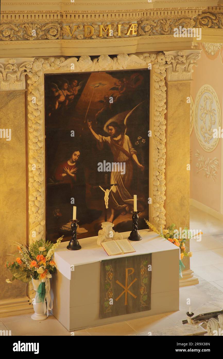 Interior view with altar and painting of baroque St. Trinitatis Church ...