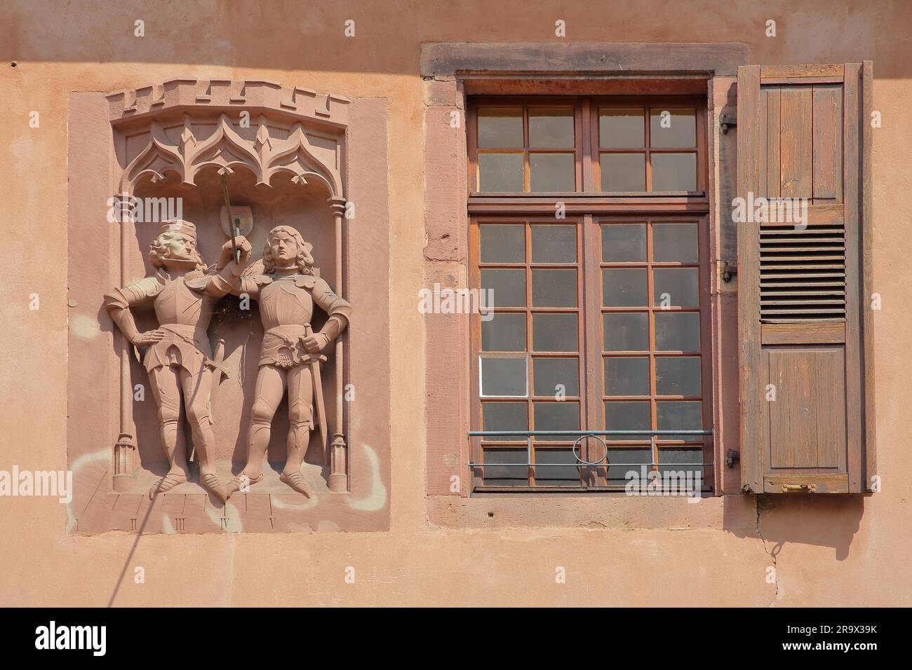 Two knight figures with sword on the wall of the Ancienna Dovane ...