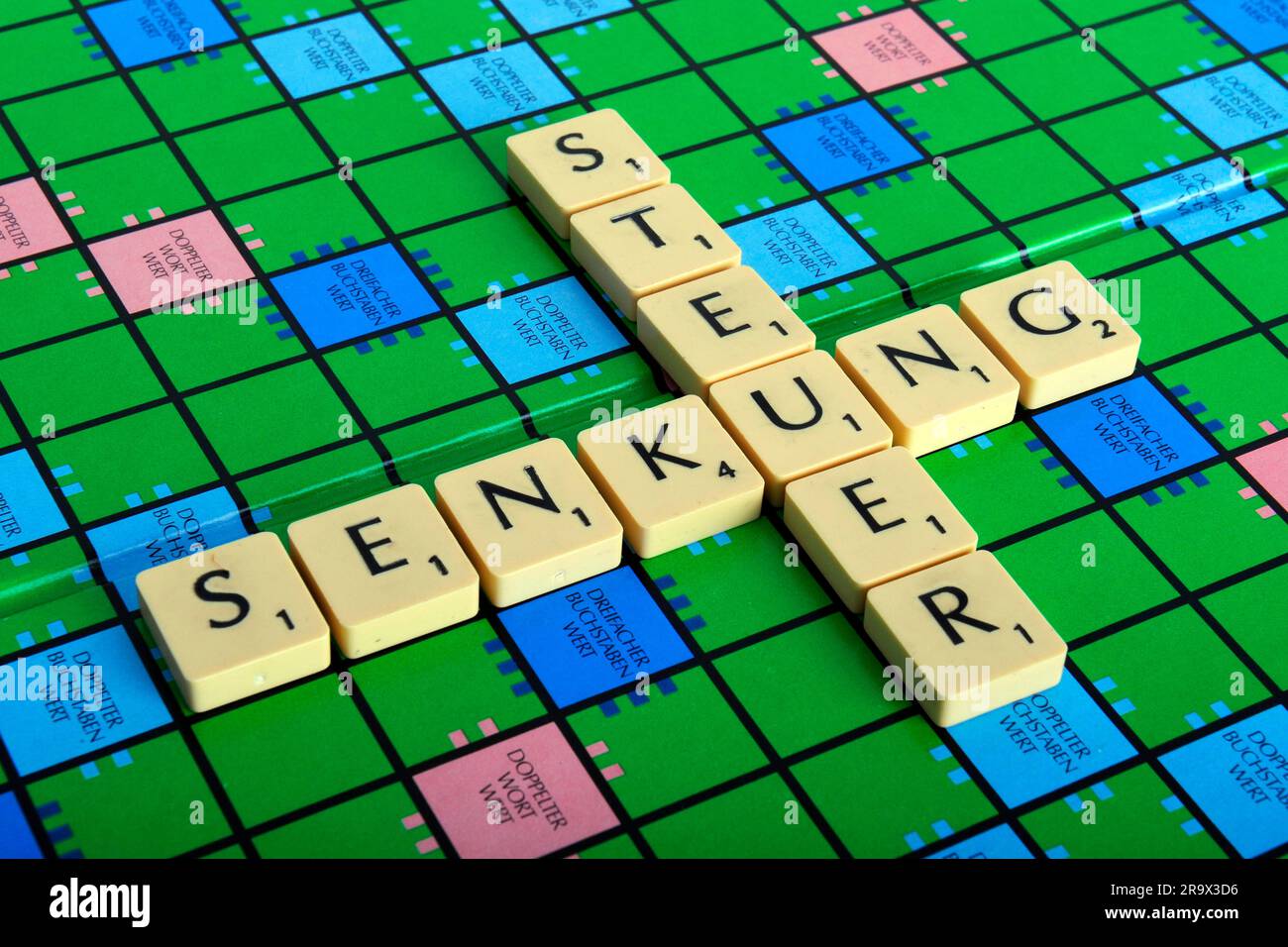 Scrabble, tax reduction, board game Stock Photo - Alamy