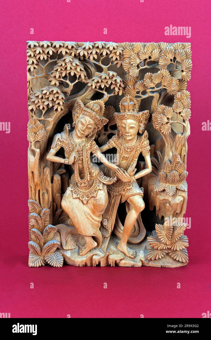 Balinese 3D carving in palm wood, cut out, object Stock Photo - Alamy