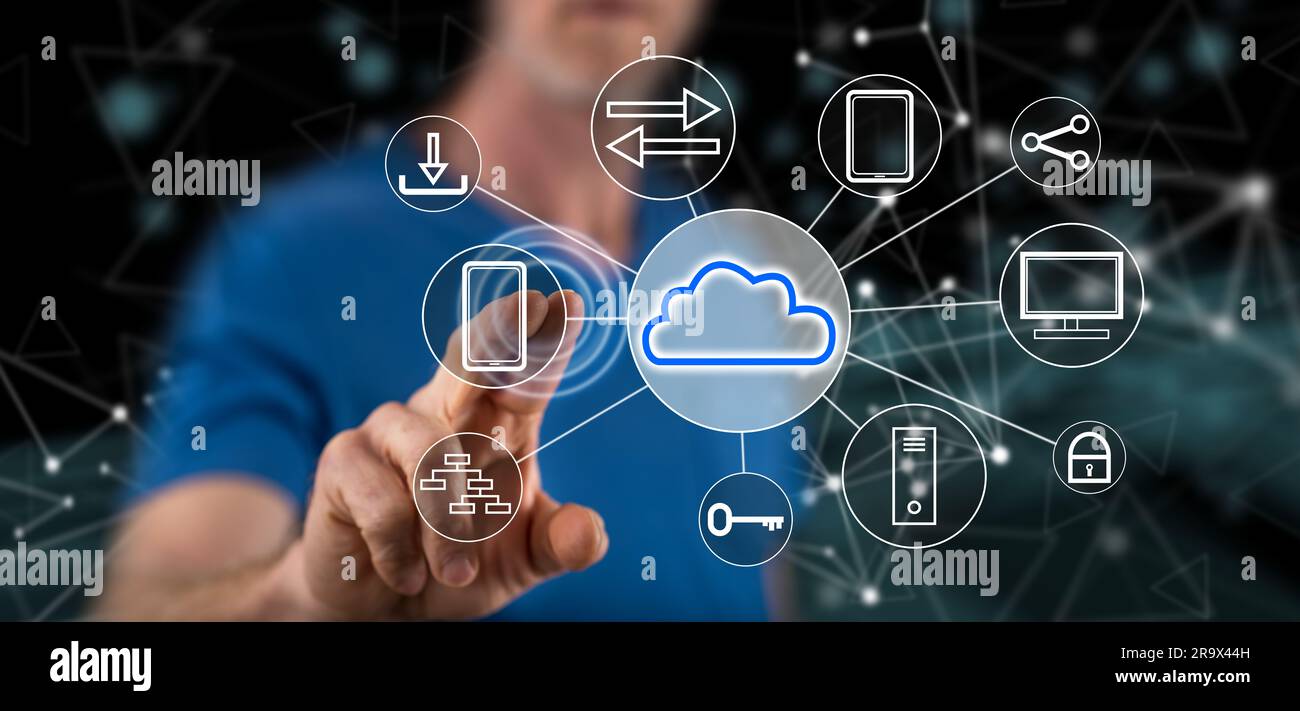 Man touching a cloud computing concept on a touch screen with his ...
