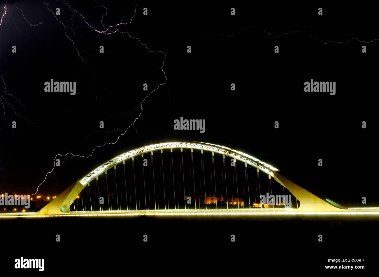 Santiago Calatrava, Lusitania, bridge at night, over river Guadiana ...